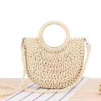 China Customized Logo One-shoulder Woven Beach Straw Bag for Women in Simple Round Design for sale