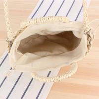 China Customized Logo One-shoulder Woven Beach Straw Bag for Women in Simple Round Design for sale