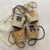 China Summer Style Designer Handmade Round Straw Woven Beach Bucket Bag for Women's Handbag for sale