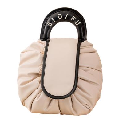 China Custom Logo Design PVC Makeup Bag Solid Pattern Type Drawstring Toiletry Travel Pouch for sale