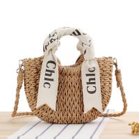 China Custom Logo Accepted Silk Scarf Travel Holiday Bag with Portable Straw Woven Material for sale