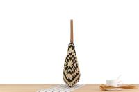 China Women's Eco-friendly Handwoven Beach Bag with Hollow Out Flower Design and PU Leather Strap for sale