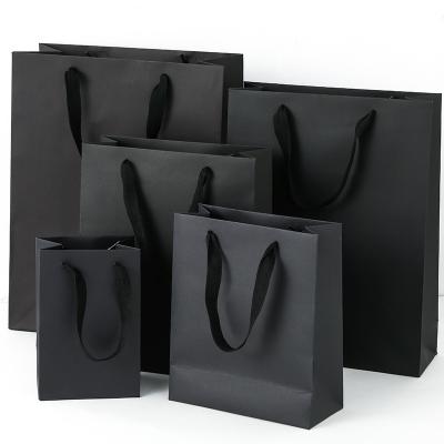 China Custom Printed Logo Luxury Boutique Shopping Paper Gift Bags Customized Gift Packaging for sale
