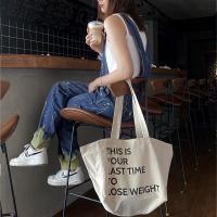 China Large Capacity Canvas Shopping Crossbody Bag with Cartoon Pattern and Zipper Closure for sale