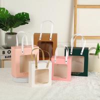 China Custom Printed Kraft Handle Paper Bag for Retail Packaging Clothing Shoes Fur Gifts for sale