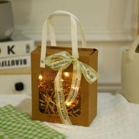 China Custom Printed Kraft Handle Paper Bag for Retail Packaging Clothing Shoes Fur Gifts for sale