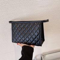 China Polyester Cloth Quilted Travel Cosmetic Bags for Your Custom Logo Puffy Puffer Needs for sale