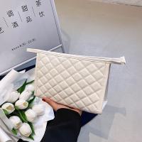 China Polyester Cloth Quilted Travel Cosmetic Bags for Your Custom Logo Puffy Puffer Needs for sale