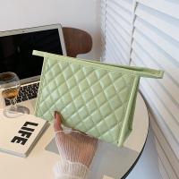 China Polyester Cloth Quilted Travel Cosmetic Bags for Your Custom Logo Puffy Puffer Needs for sale
