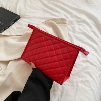 China Polyester Cloth Quilted Travel Cosmetic Bags for Your Custom Logo Puffy Puffer Needs for sale