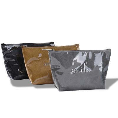 China Custom Logo Print Zipper Storage Bag Luxury Commercial Dupont Toiletry Bag for Daily for sale