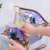China TPU Transparent Cosmetic Bag Custom Logo Beauty Multi-function Laser Cosmetic Pouch for sale