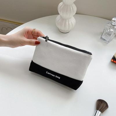 China Letter Pattern Canvas Cosmetic Bag for Small Toiletry Pouch for sale