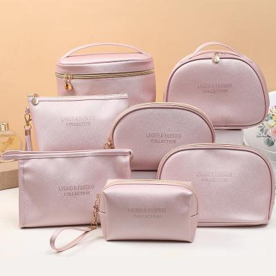 China Custom Makeup Bag Newest Fashinable Style Waterproof PU Portable Travel Cosmetic Bag for sale