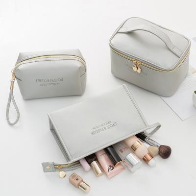 China Letter Pattern Velvet Cosmetic Bag Set of 3 for Women Travel Beauty Zipper Organizer for sale