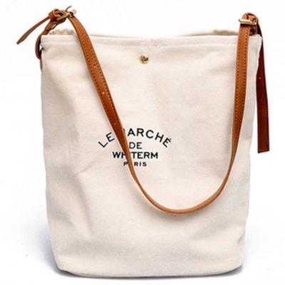 China Women's Fashion Design Custom Logo Cotton Canvas Tote Bag with Brown Leather Handles for sale