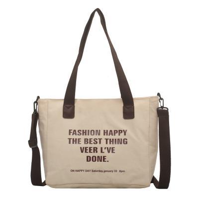 China Custom Logo Letter Cotton Canvas Tote Bag With Polyester Lining and Large Capacity for sale