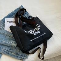 China Custom Logo Letter Cotton Canvas Tote Bag With Polyester Lining and Large Capacity for sale