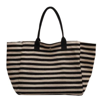 China Stay Fashionable and Organized with this Women's Custom Logo Canvas Shopping Tote Bag for sale