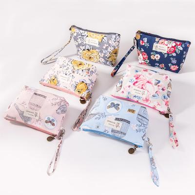 China Flower Print Zipper Pouch Cute Floral Makeup Bag for Organizing Beauty Essentials for sale