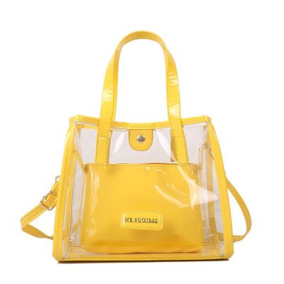 China Nylon Lining Acceptable OEM/ODM Clear Pvc Tote Shopping Bags with Colored Handle for sale