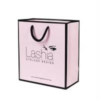 China Custom Luxury Gift Garment Paper Shopping Bags With Logo Print Newest Fashinable for sale
