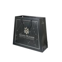 China Custom Luxury Gift Garment Paper Shopping Bags With Logo Print Newest Fashinable for sale