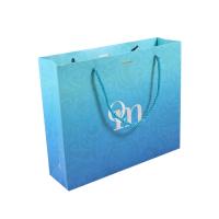 China Custom Luxury Gift Garment Paper Shopping Bags With Logo Print Newest Fashinable for sale