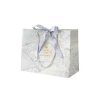 China Customized Color Cardboard Shopping Paper Bags With Ribbon Handle For Clothing Shoes for sale