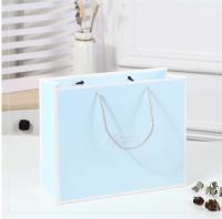China Custom Printed Shopping Bag Cardboard Luxury White Kraft Paper Gift Bag With Ribbon Handle for sale
