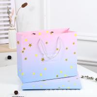 China Custom Printed Shopping Bag Cardboard Luxury White Kraft Paper Gift Bag With Ribbon Handle for sale