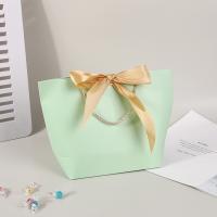 China Gift Paper Bag Packaging With Handle For Custom Clothing Shopping Bags Packing Items for sale