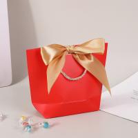 China Gift Paper Bag Packaging With Handle For Custom Clothing Shopping Bags Packing Items for sale