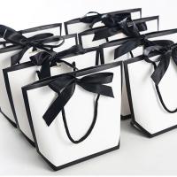 China Gift Paper Bag Packaging With Handle For Custom Clothing Shopping Bags Packing Items for sale