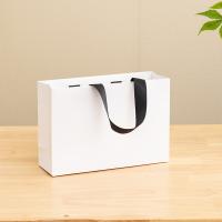 China Custom Printed Paper Bags Cardboard Luxury White Kraft Paper Gift Bag for Shopping Bag for sale