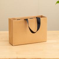 China Custom Printed Paper Bags Cardboard Luxury White Kraft Paper Gift Bag for Shopping Bag for sale