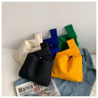 China Custom Print Logo Canvas Handbag with Toggle Closure Plain Small Square Wrist Bag for sale