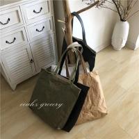 China Unisex Large Kneaded Washable Kraft Paper Hand Bag with Custom Logo and Single Handle for sale