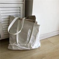 China Unisex Large Kneaded Washable Kraft Paper Hand Bag with Custom Logo and Single Handle for sale
