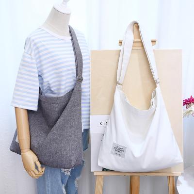 China Gifts Custom Logo Printed Large Canvas Bag with Letter Pattern Type and Solid Color Handle for sale