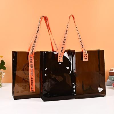 China Eco-friendly Custom Logo Clear Transparent Waterproof PVC Tote Bag with Zipper and Pocket for sale