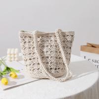 China Simple Casual Lady Summer Straw Handmade Bucket Bag for Women Beach Vacation Shoulder Bag for sale