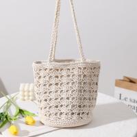 China Simple Casual Lady Summer Straw Handmade Bucket Bag for Women Beach Vacation Shoulder Bag for sale