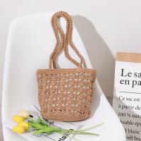 China Simple Casual Lady Summer Straw Handmade Bucket Bag for Women Beach Vacation Shoulder Bag for sale
