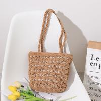 China Simple Casual Lady Summer Straw Handmade Bucket Bag for Women Beach Vacation Shoulder Bag for sale