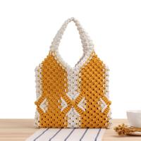 China Polyester Lining Summer Straw Beach Bag for Women Handmade Woven Bohemian Knitted Purse for sale