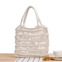 China Customized Color 2022 Summer Handmade Women Straw Bag Hollowed Out Woven Beach Hand Bag for sale