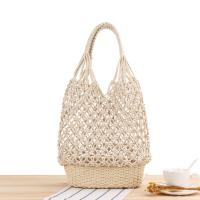 China Newest Fashionable Customized Color Knit Hollow Out Woven Beach Bags Straw Tote Bag for sale