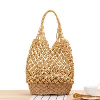 China Newest Fashionable Customized Color Knit Hollow Out Woven Beach Bags Straw Tote Bag for sale