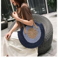China 2022 Handwoven Round Beach Shoulder Bag Straw Bag with Leather Handle and Custom Logo for sale